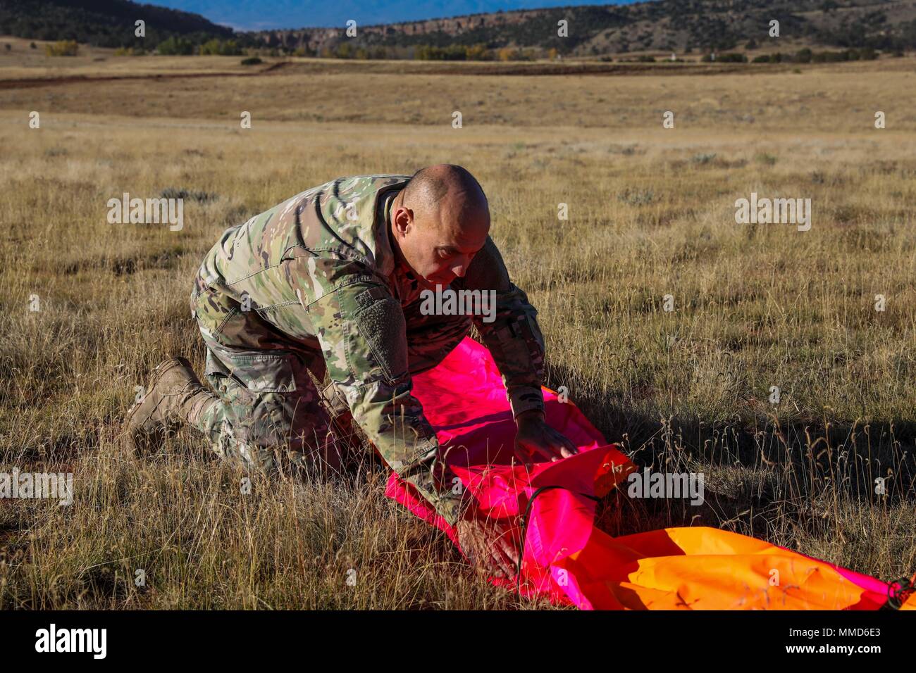 A Jumpmaster with 10th Special Forces Group (Airborne) uses VS-17 ...