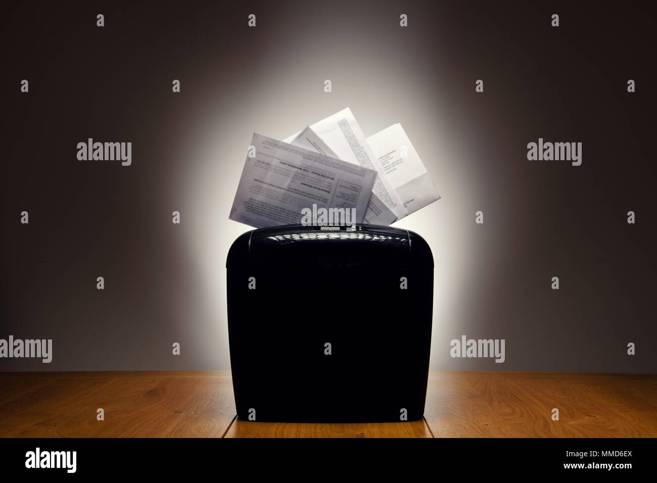 Office shredder and personal documents being shredded Stock Photo - Alamy