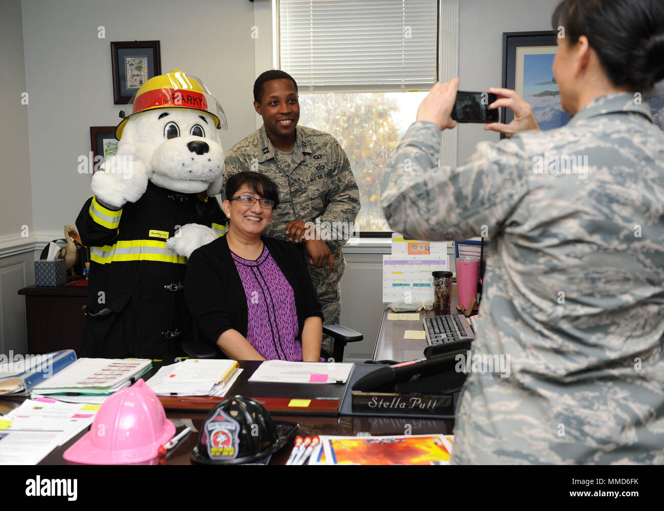 Col. Debra Lovette, 81st Training Wing commander, takes a photo of her ...