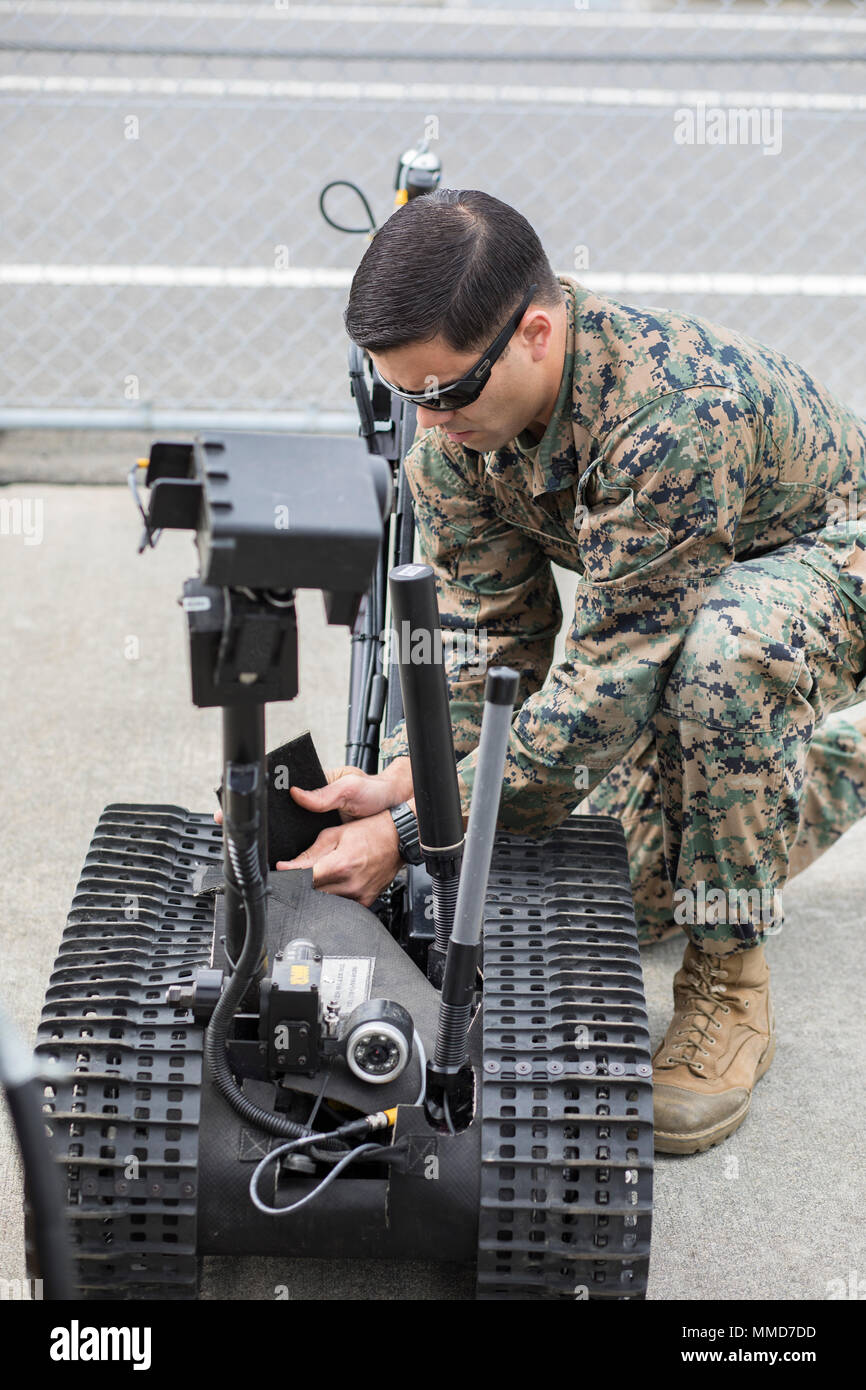 .S. Marine Corps Sgt. Austin Mchenry, an explosive ordnance disposal ...