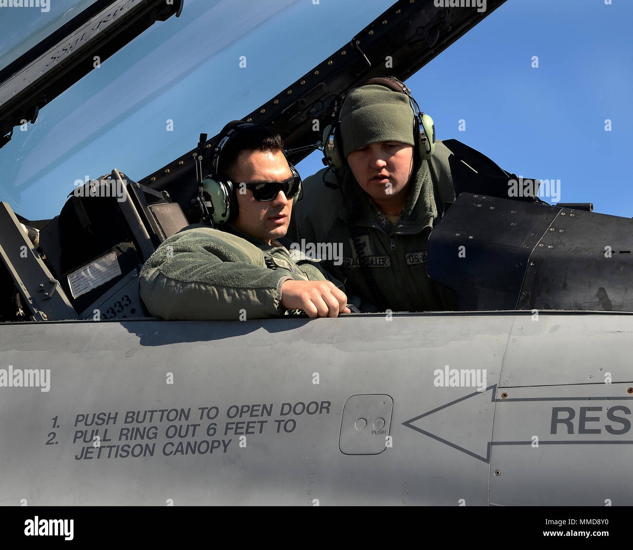 U.S. Air Force Airman 1st Class Robert L. Moy and Senior Airman Michael ...