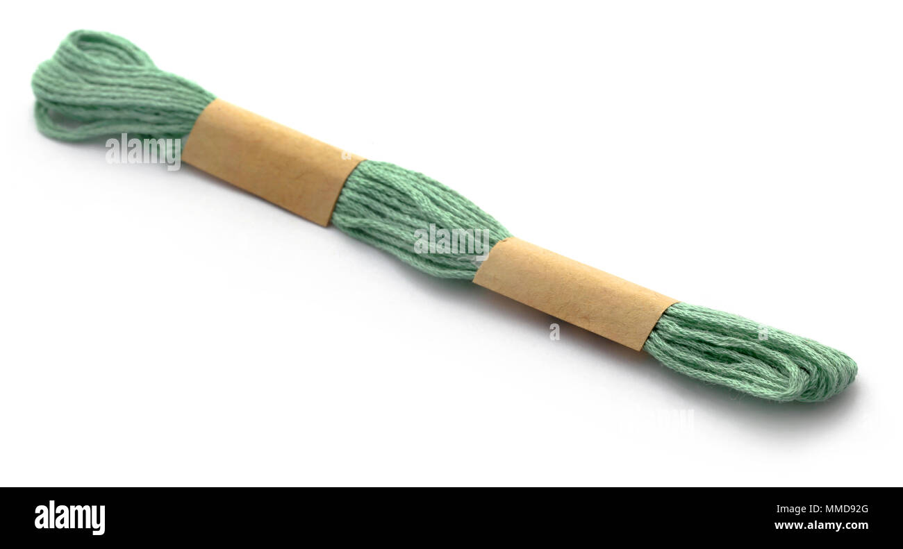 Woolen thread over white background Stock Photo - Alamy