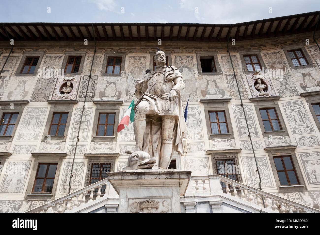 A statue of Cosimo I subduing a dolphin in front of Palazzo della ...