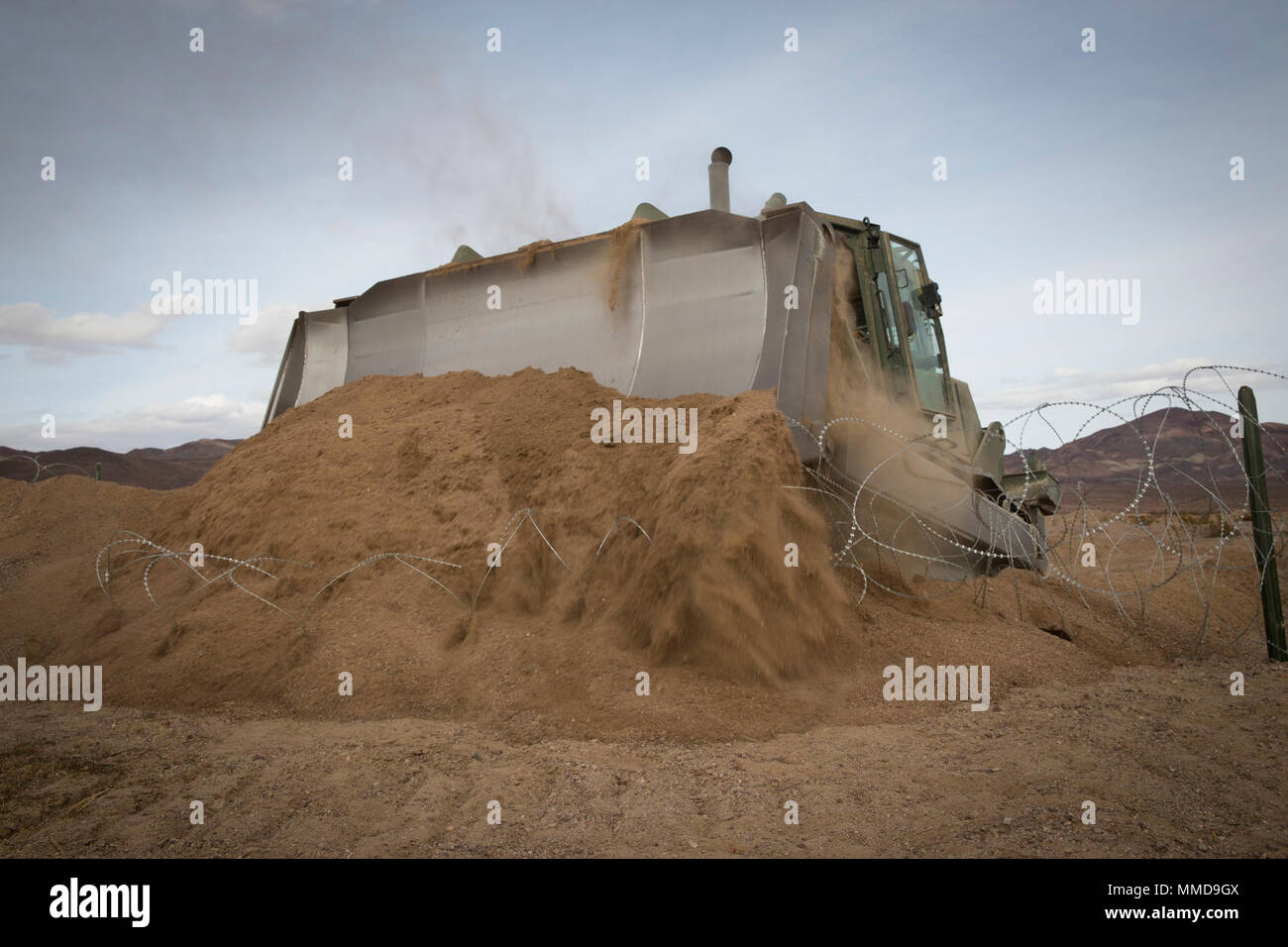 A U.S. Marine with 1st Combat Engineer Battalion, 1st Marine Division ...