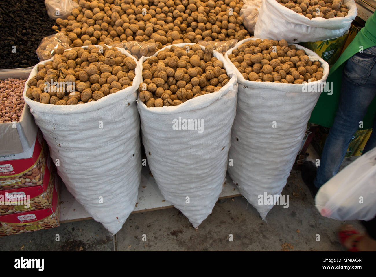Sack of whole fresh walnuts with hard nutshells Stock Photo - Alamy