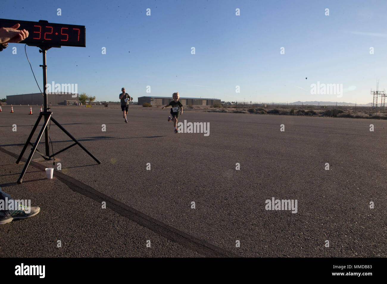 U.S. Marines and civilians participate in a 5k race on Marine Corps Air ...