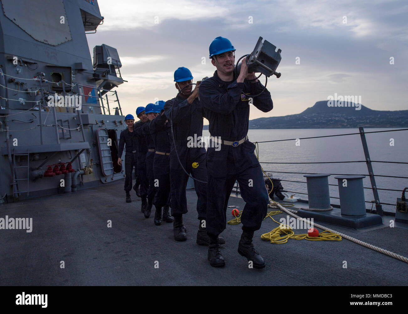 SUPPORT ACTIVITY SOUDA BAY, Greece (March 17, 2018) – Sailors carry a ...