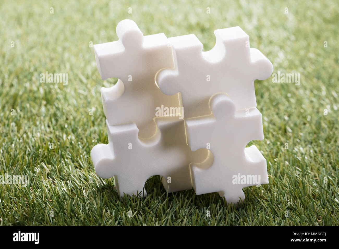 Four piece jigsaw puzzle hi-res stock photography and images - Alamy