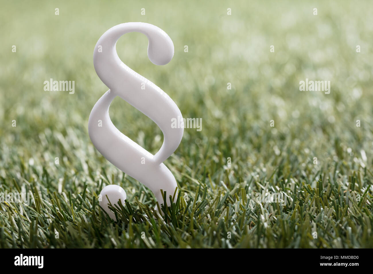 High Angle View Of White Paragraph Symbol On Green Grass Stock Photo ...