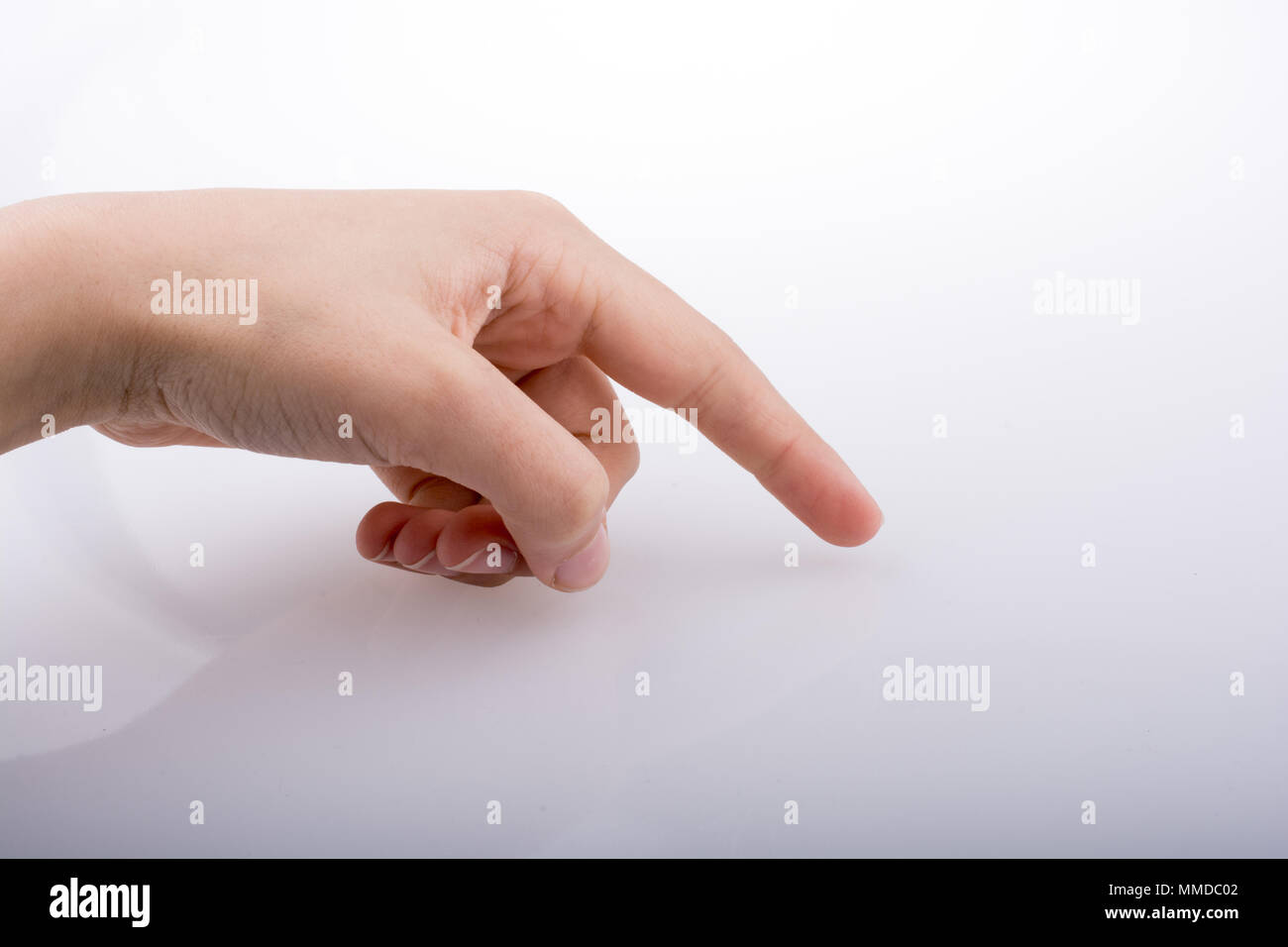 Hand pointing on a white background Stock Photo - Alamy