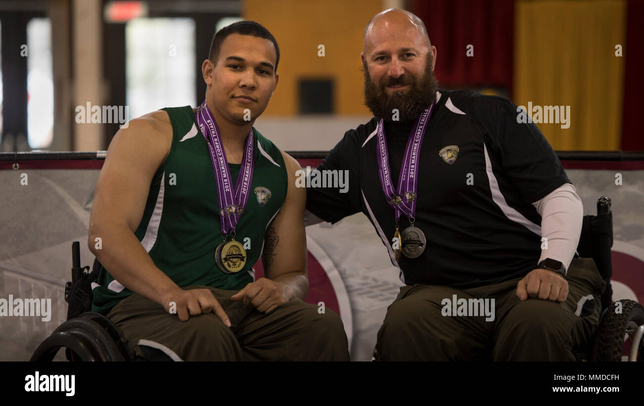 U.S. Marine Corps Cpl. Austin Chandler, left, and U.S. Marine Corps ...