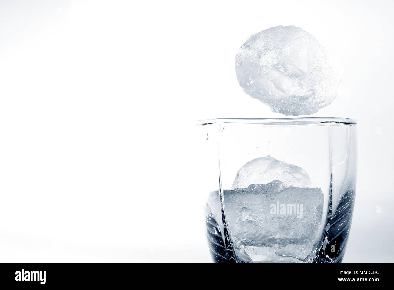 Ice cube with carbonated drink Stock Photo - Alamy