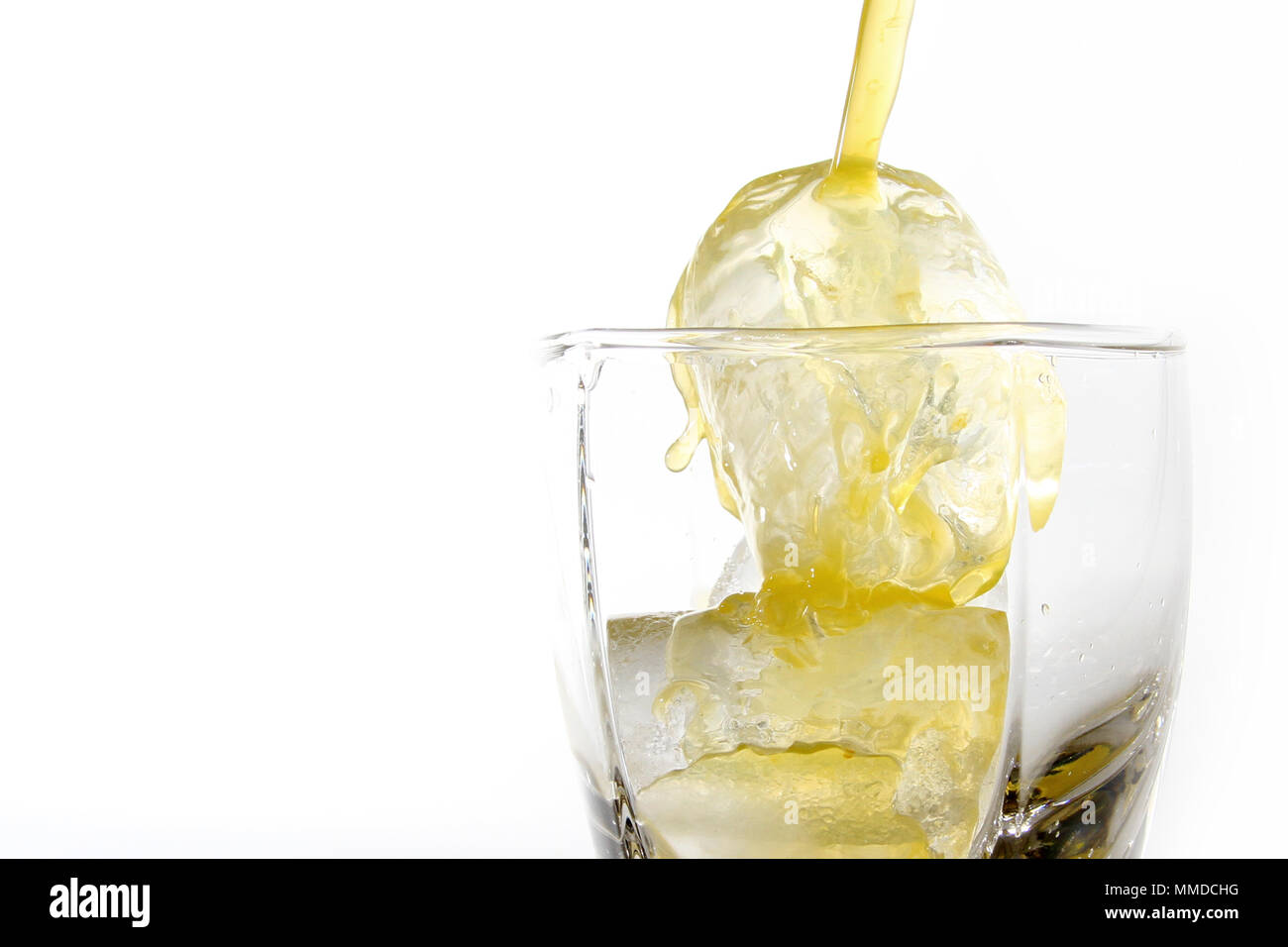 Ice cube with carbonated drink Stock Photo - Alamy