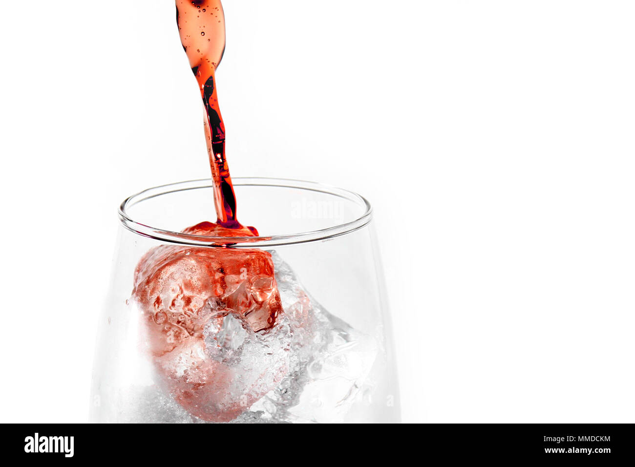 Ice cube with carbonated drink Stock Photo - Alamy