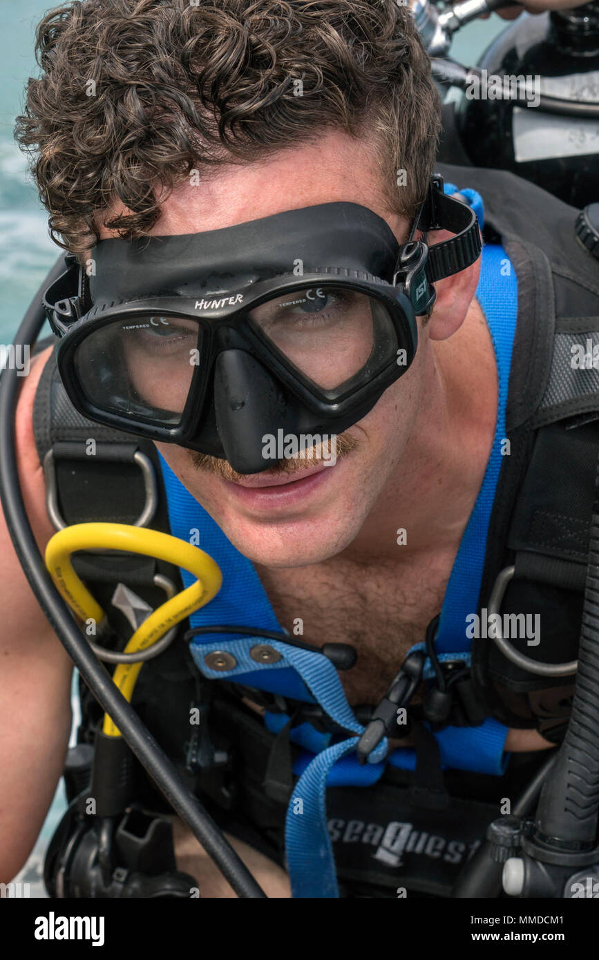 Navy Diver 2nd Class David Lang, assigned to the Naval Base Guam Dive ...