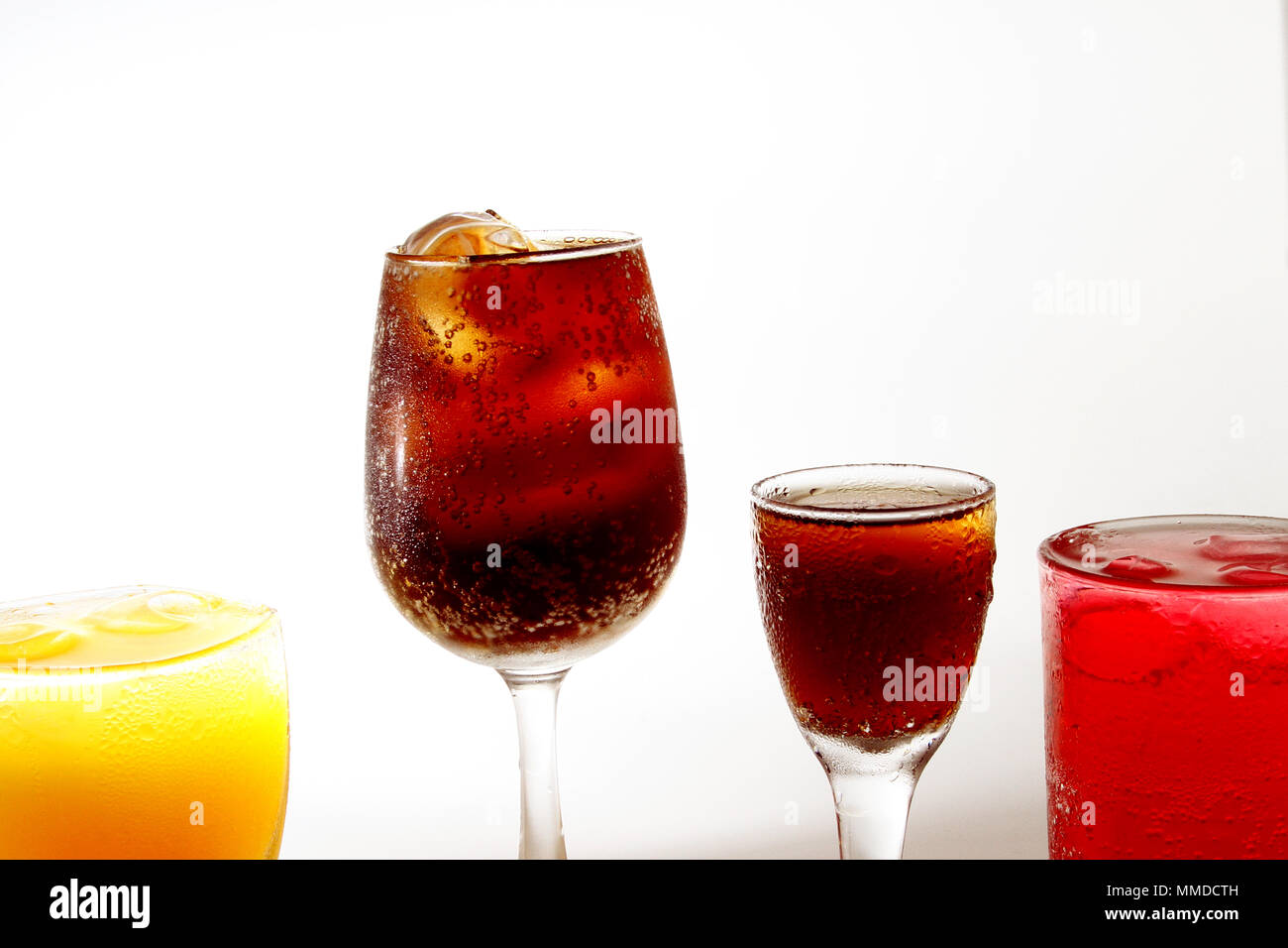 Ice cube with carbonated drink Stock Photo - Alamy