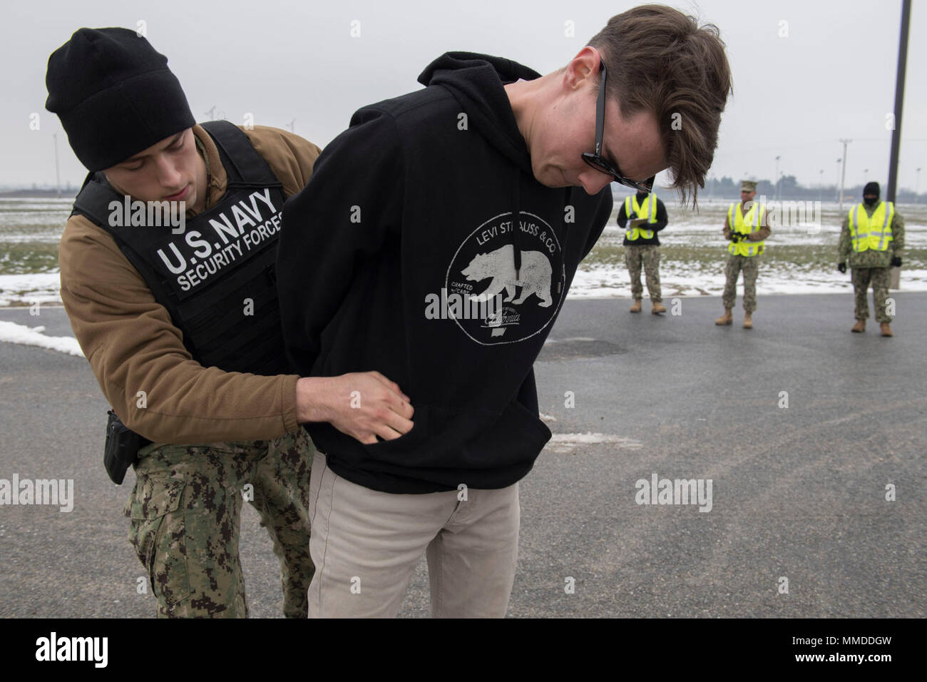 Romania (March 21, 2018) Master-at-Arms Seaman Carson Marshall, left ...