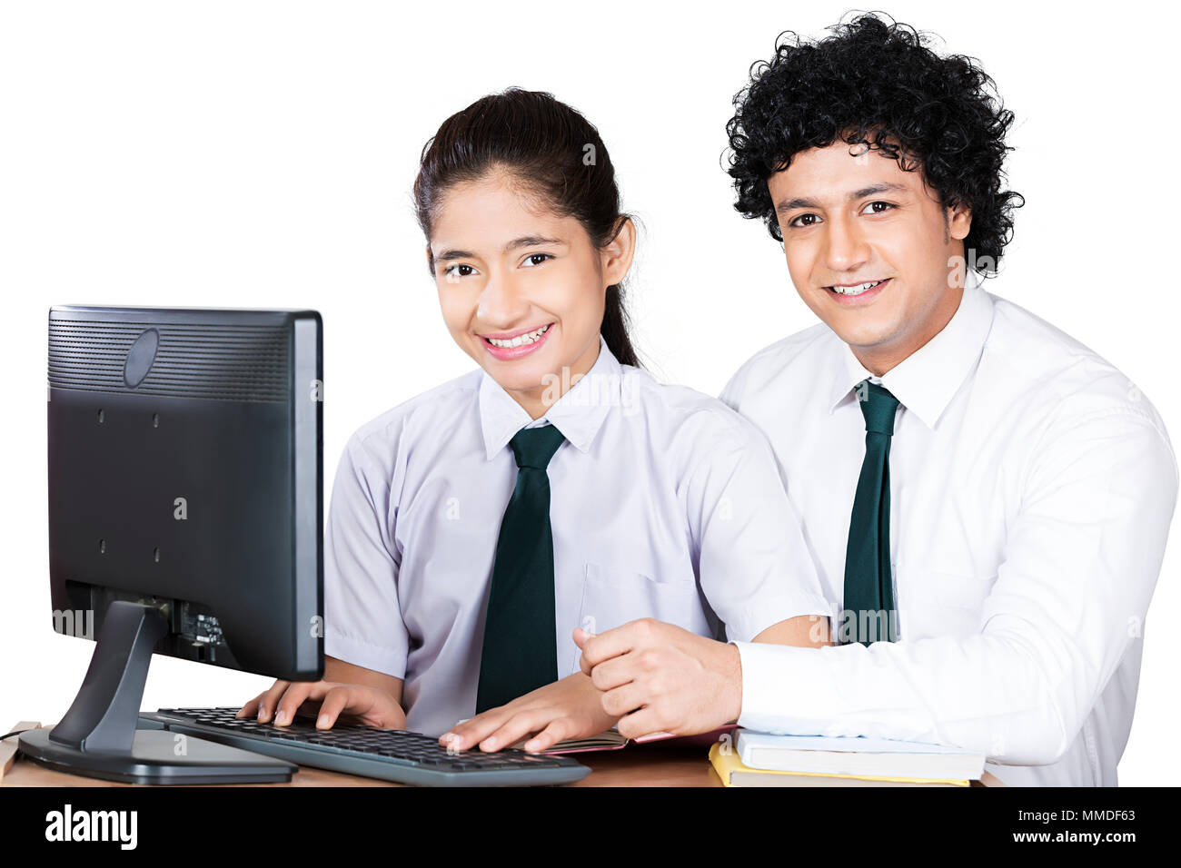 Students computer 2 uniform hi-res stock photography and images - Alamy