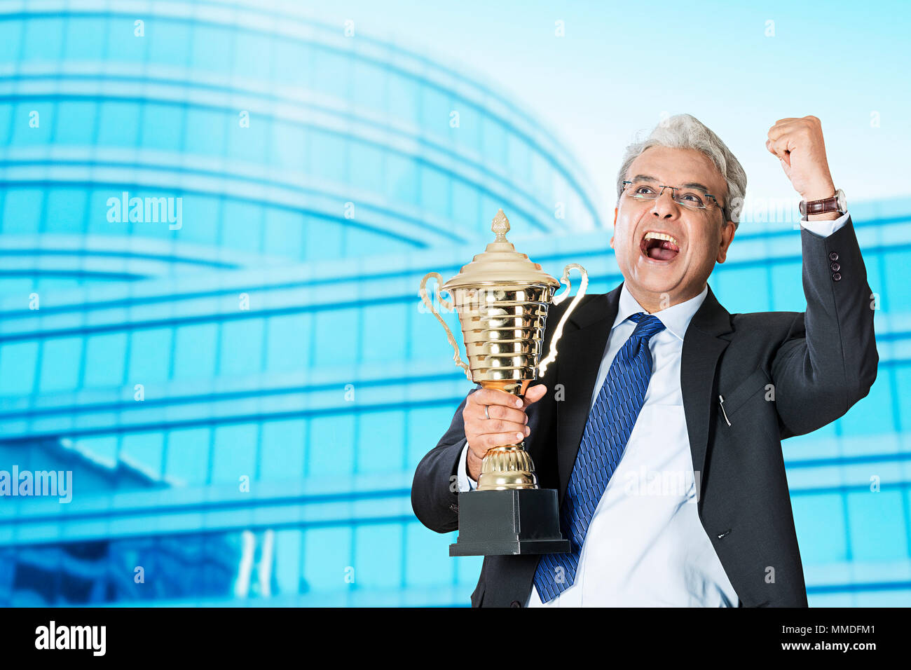 Half length celebrating smiling trophy hi-res stock photography and ...