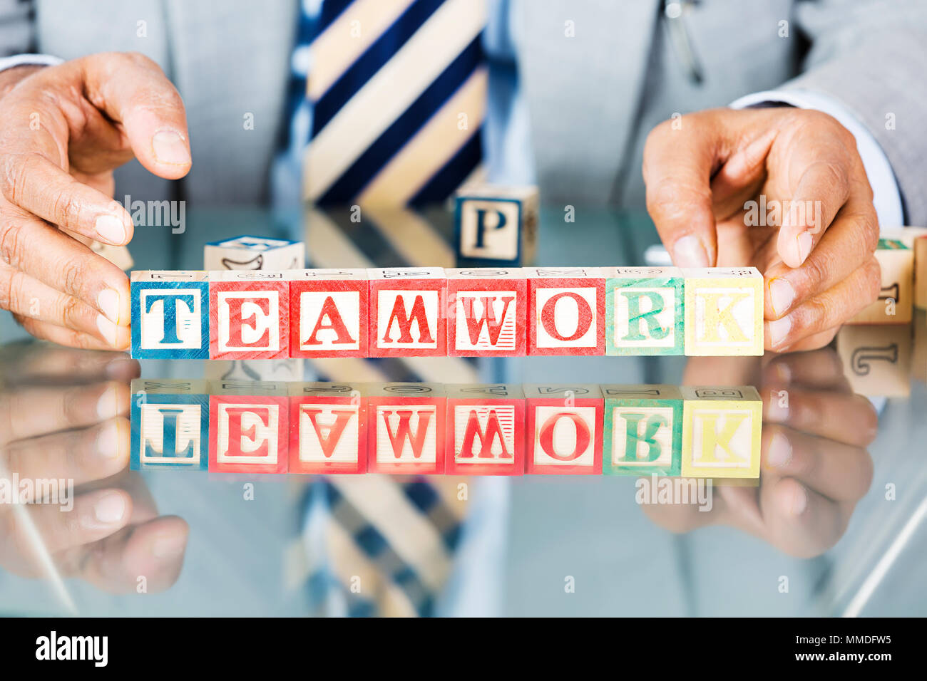 Part-Of Business man Holding Alphabet Block s Teamwork Success ...