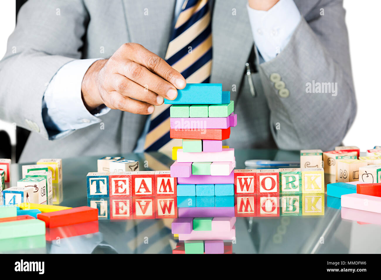 Close-Up Business male Wmployer Holding Building Blocks Stack Teamwork ...