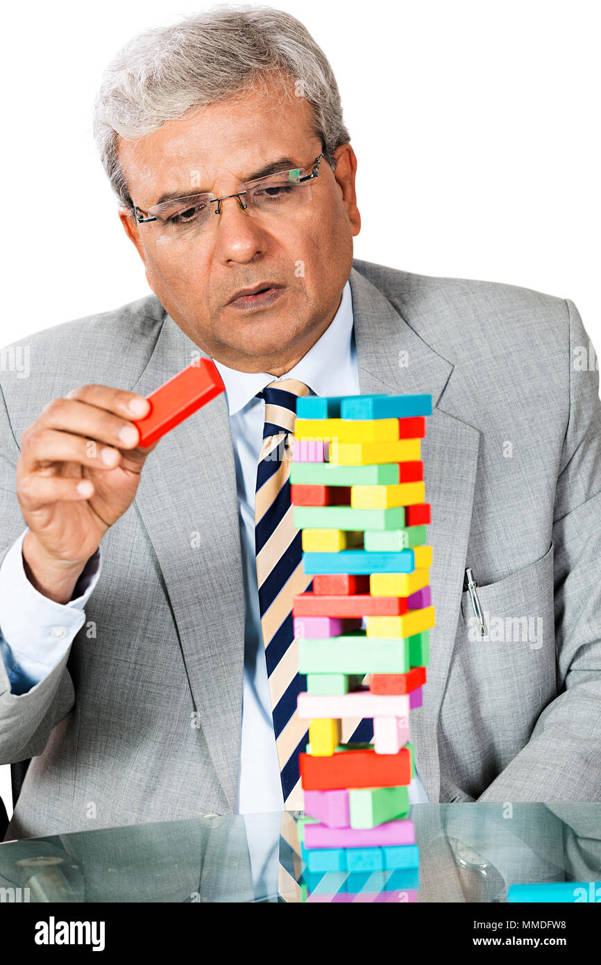 One Senior Businessman Holding Blocks Planning, risk and wealth ...