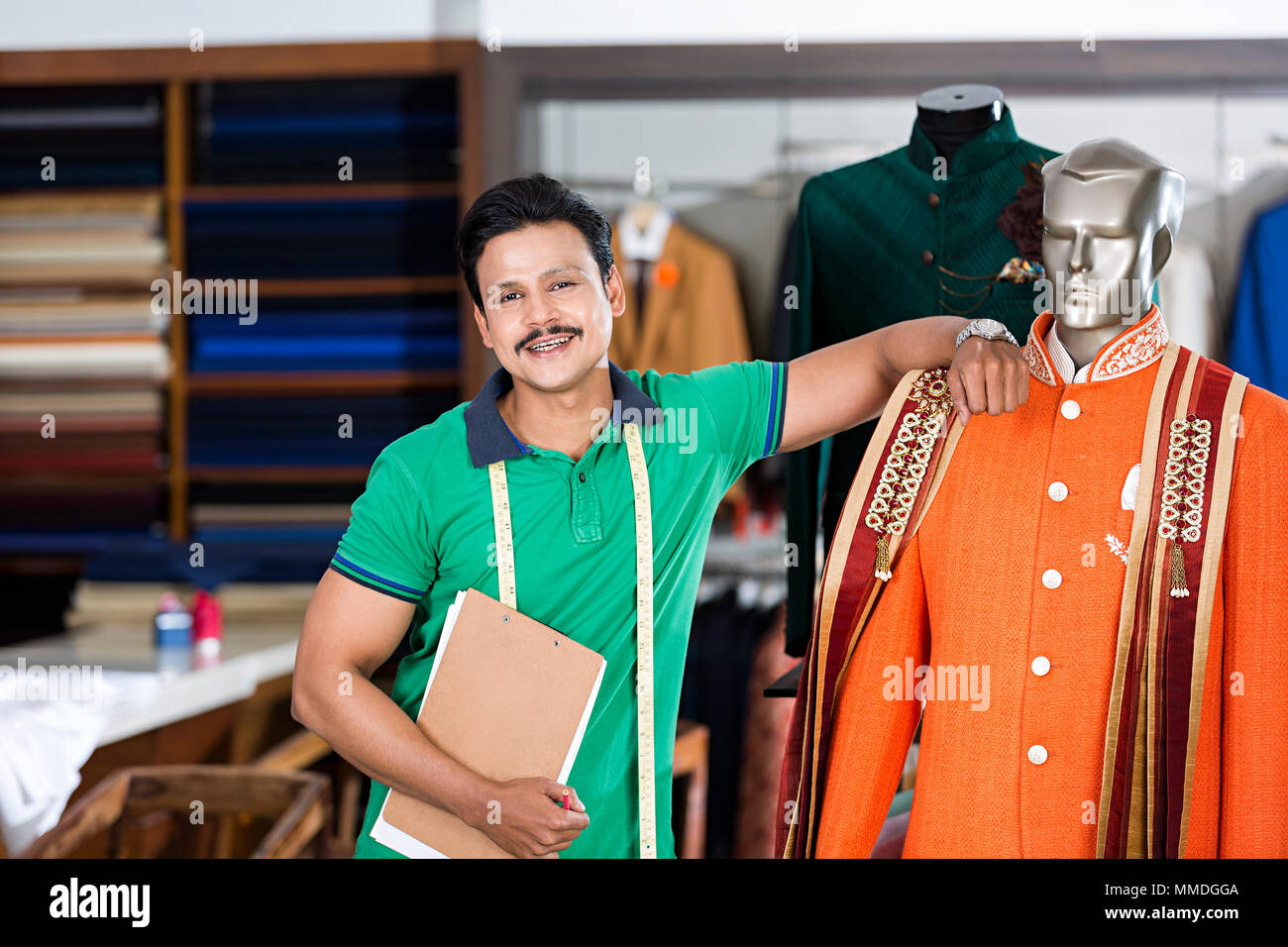 Tailor employee hi-res stock photography and images - Alamy