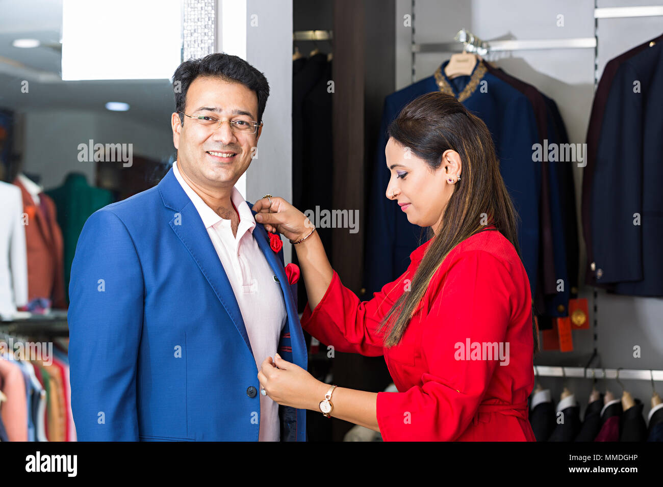 Indian couple shopping in clothes shop hi-res stock photography and ...