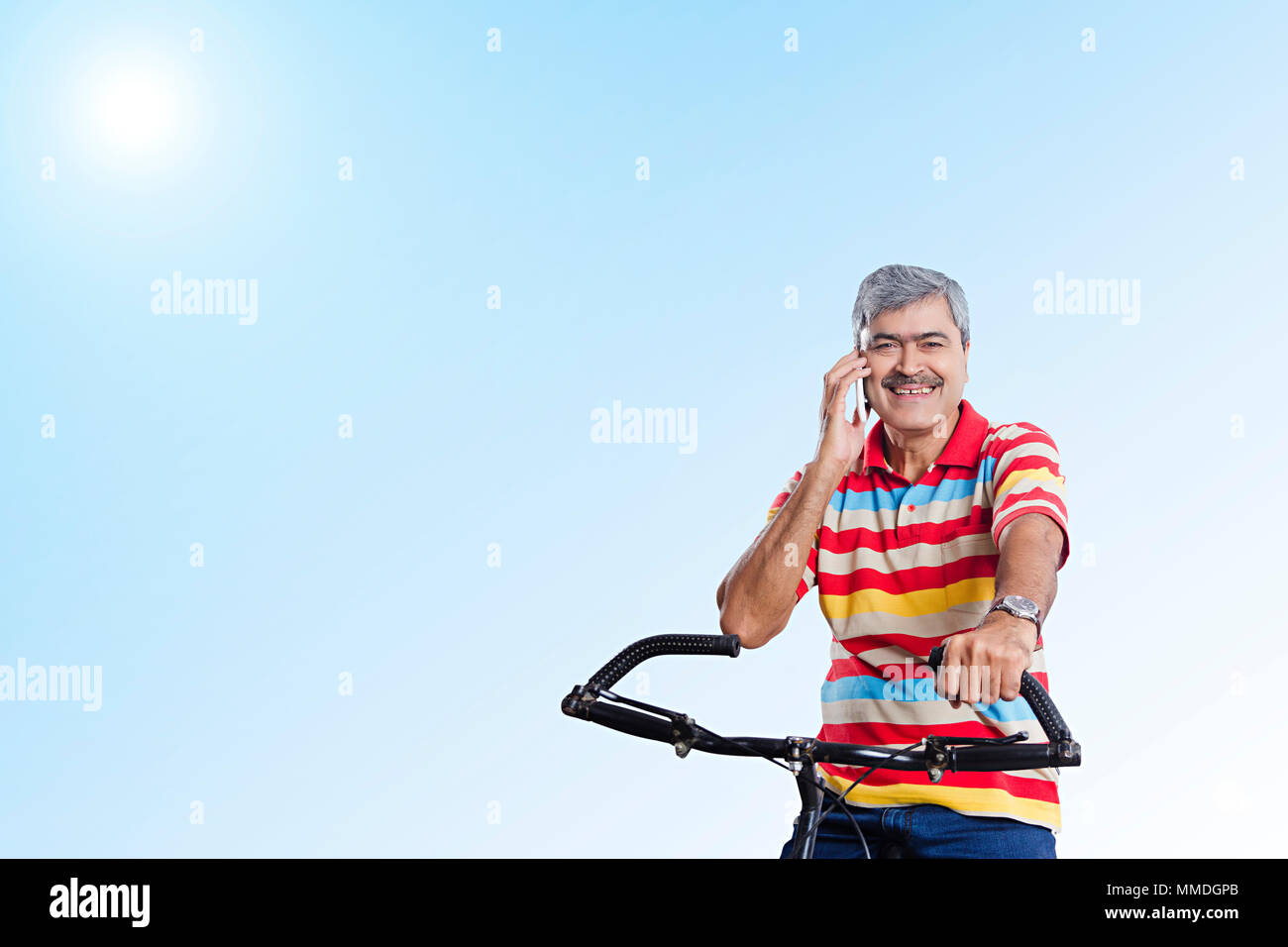 Happy One Old Man Sitting Cycle And talking On Cellphone Outdoors Stock ...