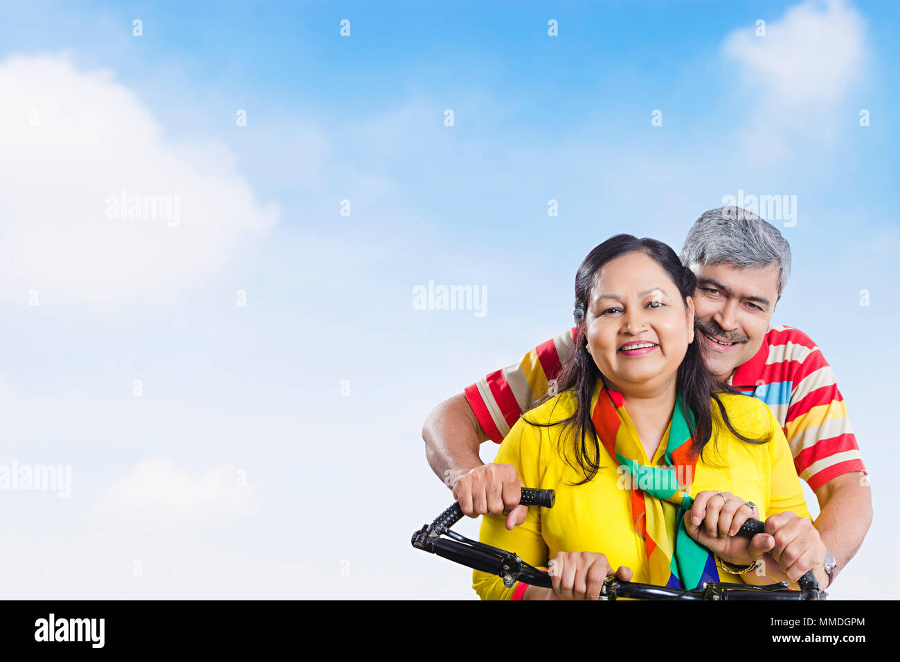 Indian old man riding bicycle hi-res stock photography and images - Alamy