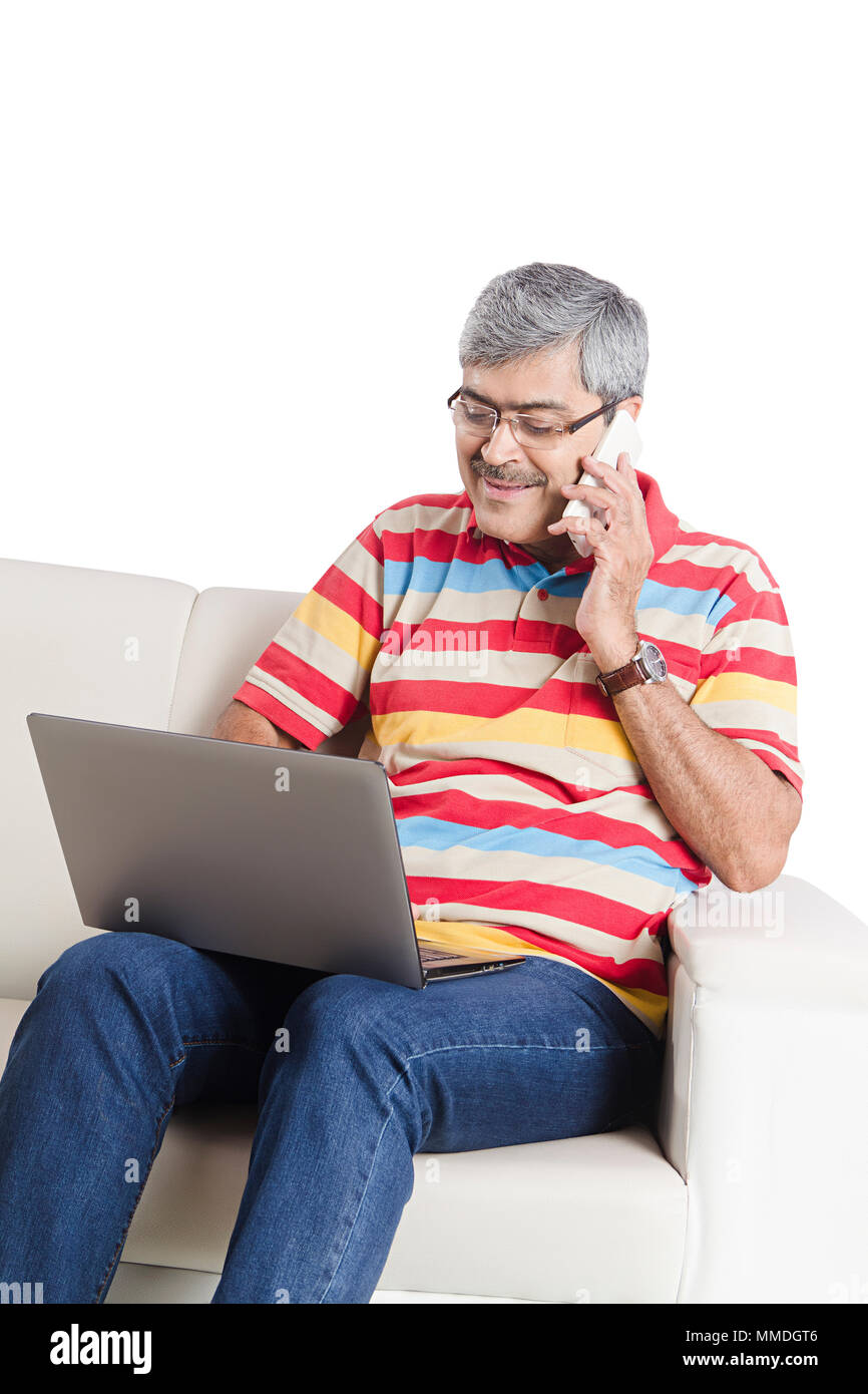 Indian old man sitting sofa laptop hi-res stock photography and images ...