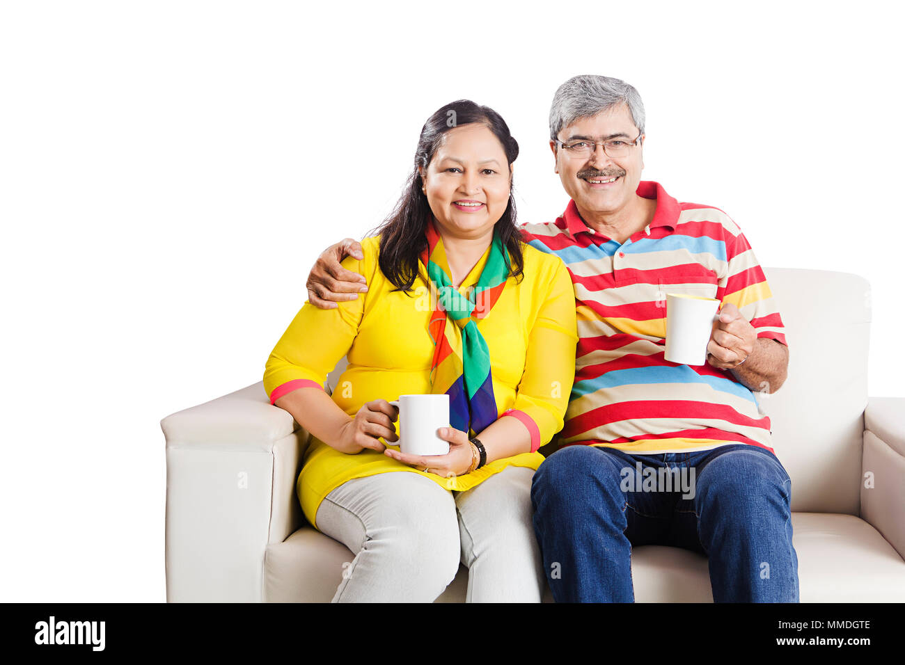 Indian old couple sitting sofa drinking tea hi-res stock photography ...