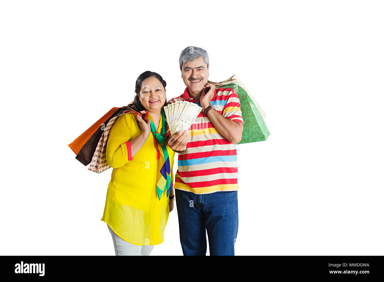 Elderly woman carrying shopping bags hi-res stock photography and ...