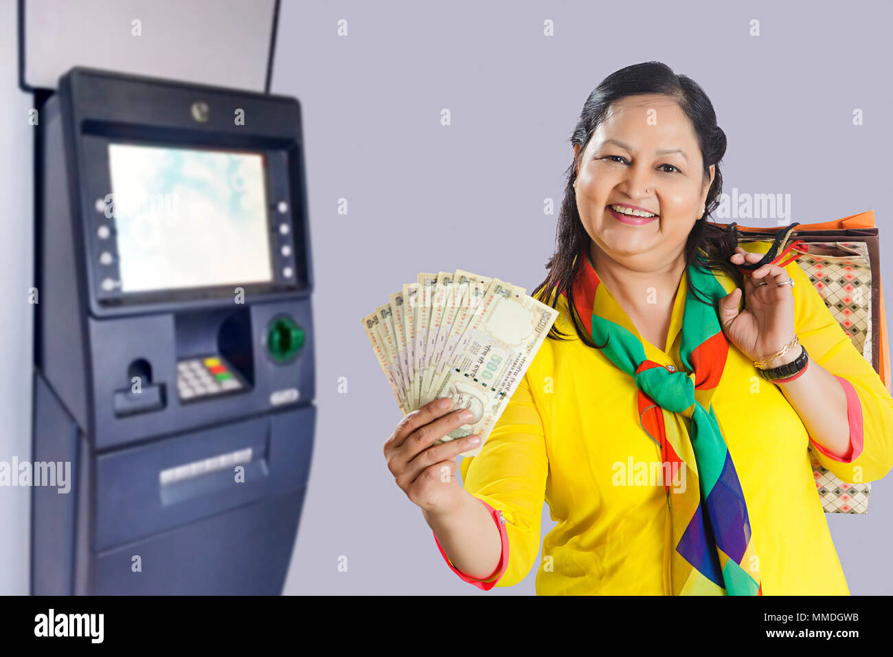Old Woman Showing Money Rupees Banknotes With Shopping-Bags At-ATM ...