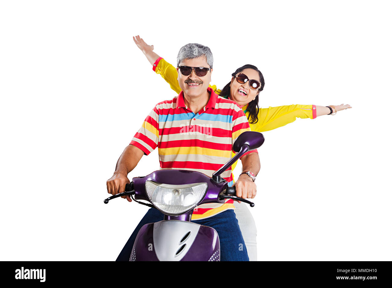 Indian married couple riding scooter hi-res stock photography and ...