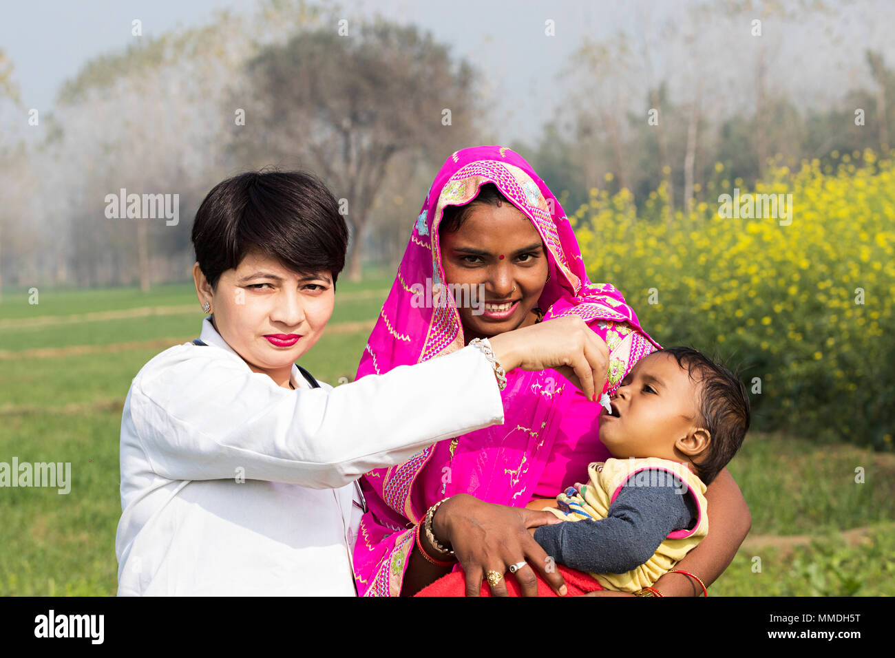 Rural Villager Mother And Doctor Child Giving Polio-Vaccine Survey ...