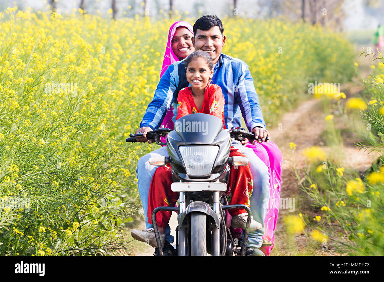 Rural Villager Family Parents And Daughter Ride Motorbike Enjoying ...
