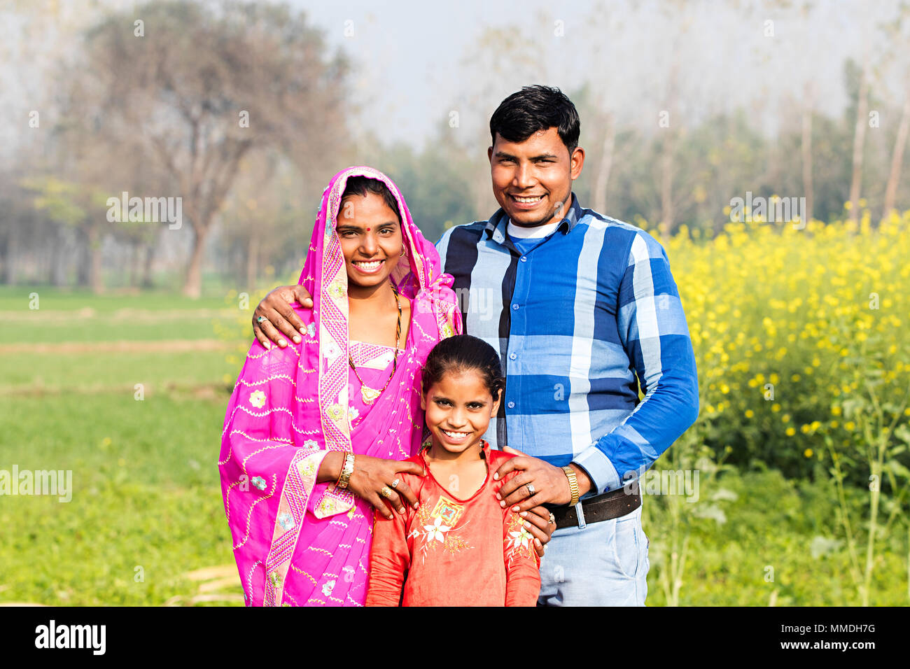 Smiling Rural Farmer Parents And Daughter Standing Farm Village Stock ...