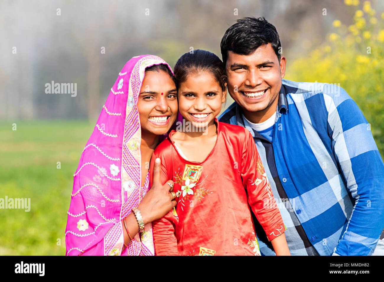 Smiling Rural Farmer Parents And Kid Daughter Together Farm Village ...