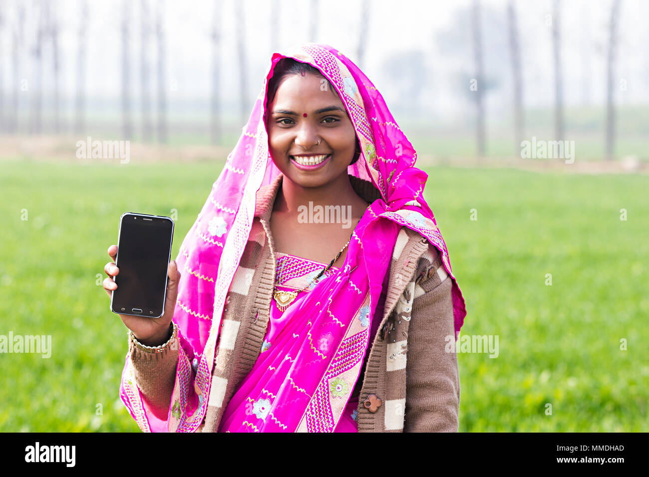 One Rural Woman Housewife Showing New Cell-Phone Farm Village Stock ...