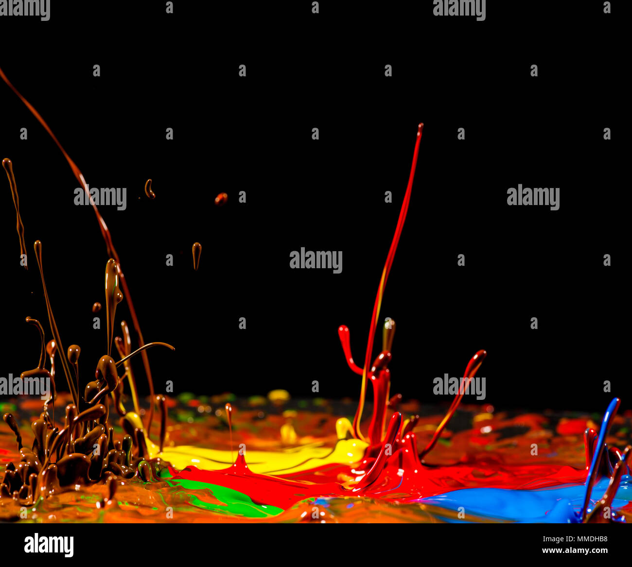 Abstract color splash on black background Stock Photo - Alamy