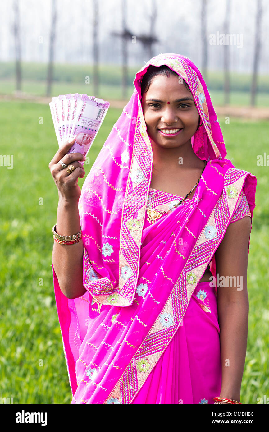 Indian rural villager woman money hi-res stock photography and images ...