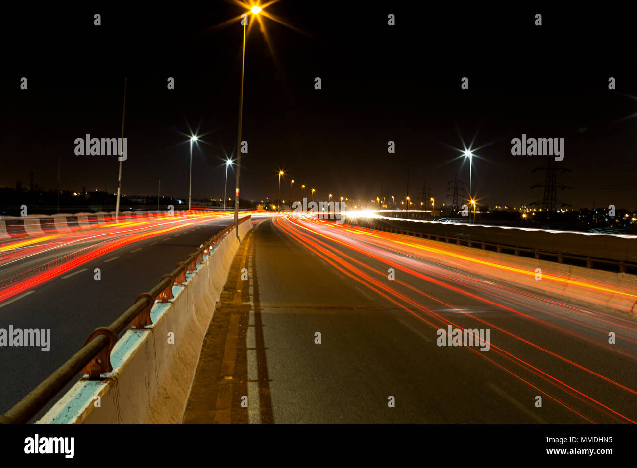 Blur motion shot of traffic on highway Street Speed Overpass At-Night ...