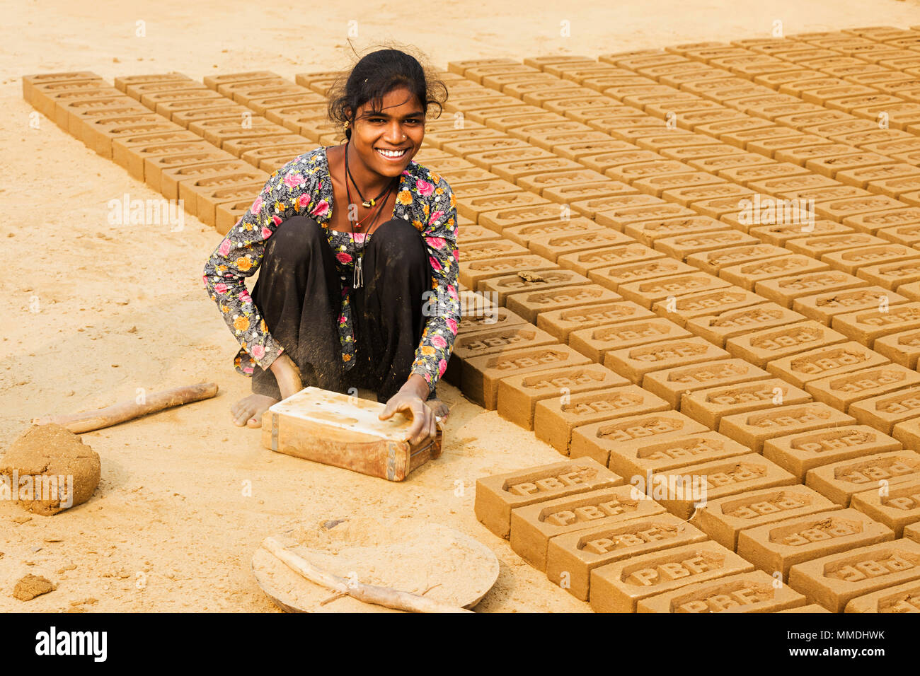 One Rural Teenage Girl Worker Works at a brick factory Stock Photo - Alamy
