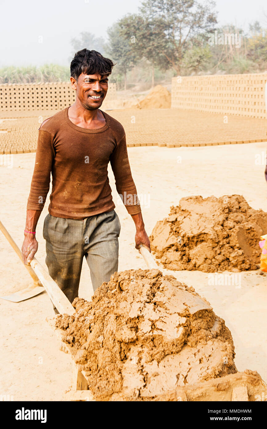 One Rural Male Labour working at a brick kiln At Brick-Factory Stock ...