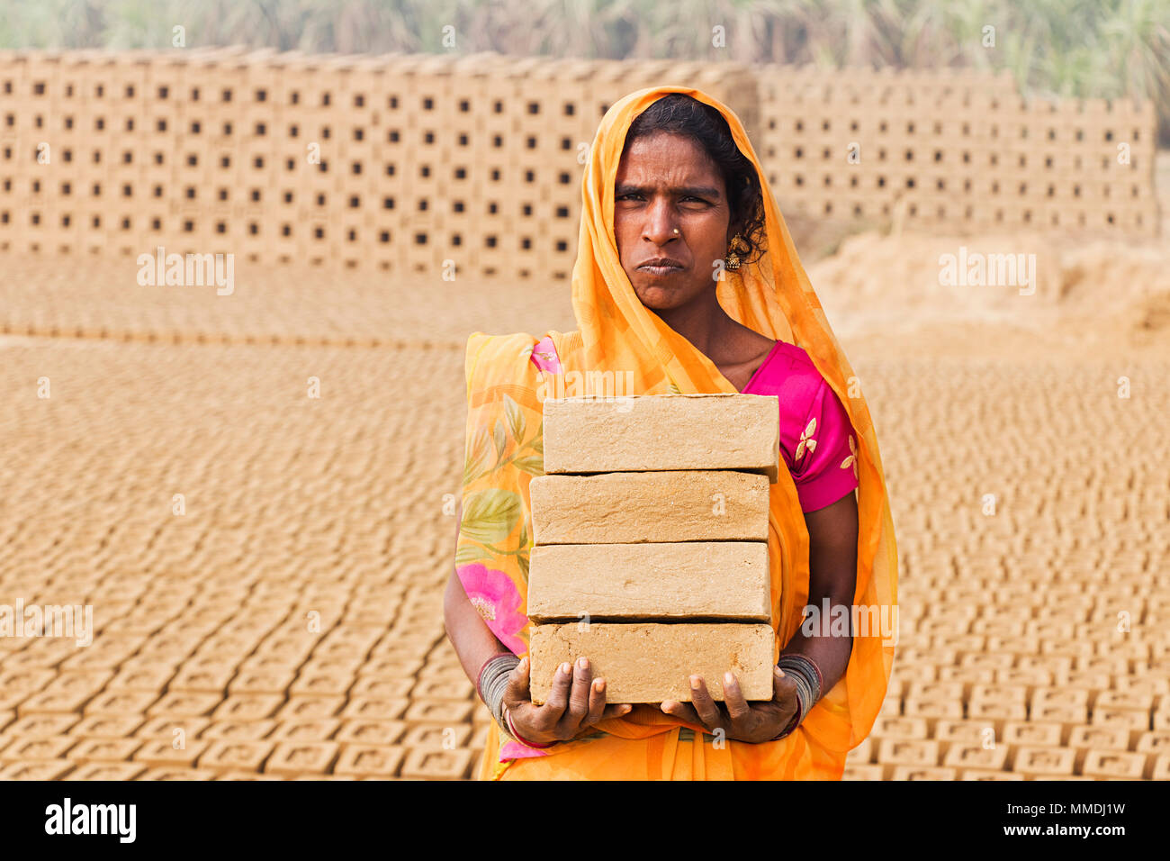 One Rural Woman Labour carrying Stack bricks Working Bricks-Factory ...