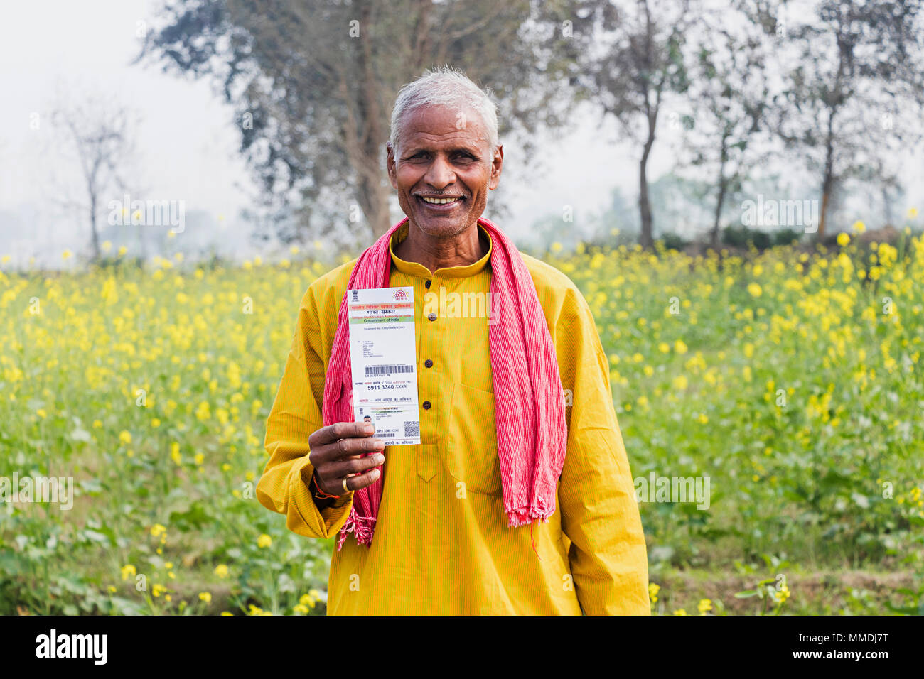 One Senior Man Villager Showing Aadhaar-Card Government -Id In-Farm ...