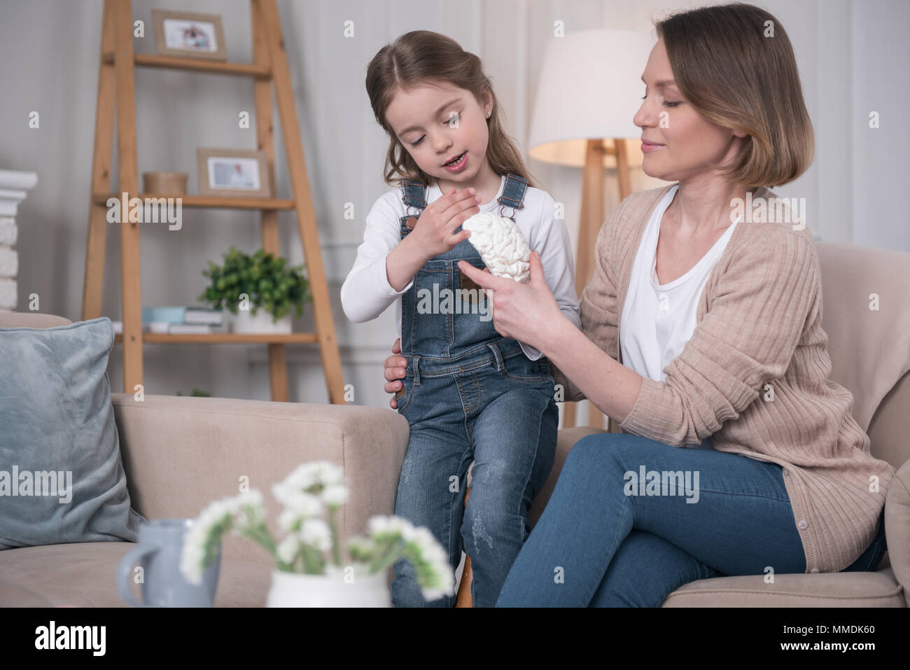 Clever girl learning how the brains work Stock Photo - Alamy