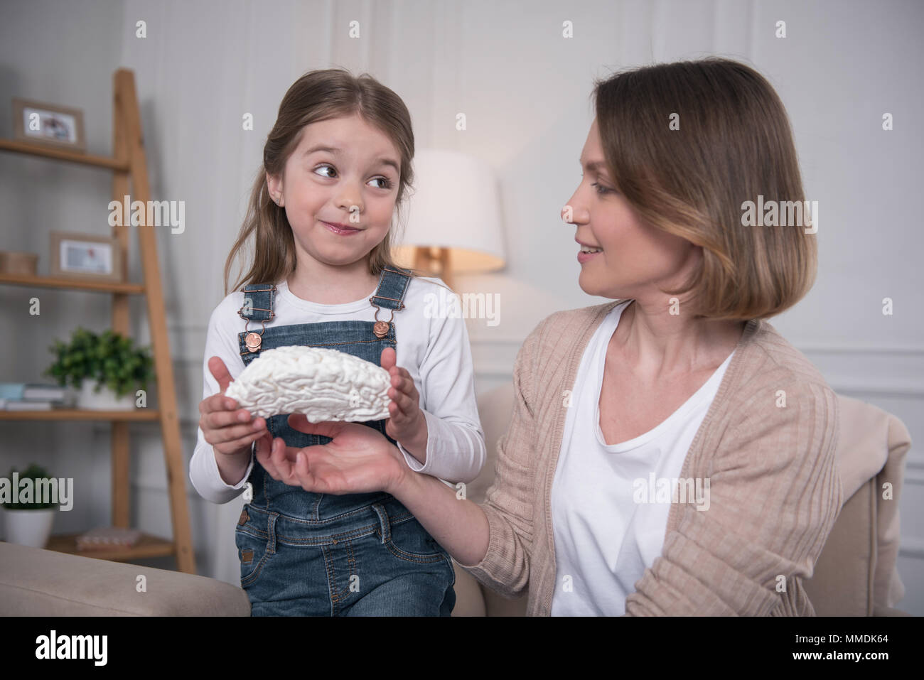 Smart girl learning how the brains work Stock Photo - Alamy