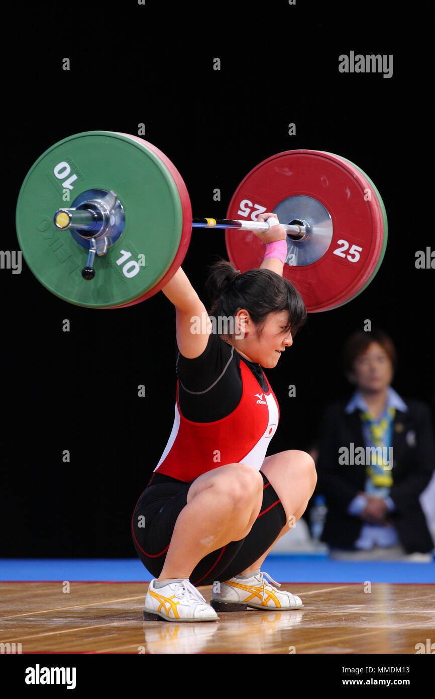 Ayano Tani of Japan competes in the Women's 69kg weight lifting program ...